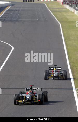 L-R) Alex Yoong (MAL) Minardi, Mark Webber (AUS) Minardi and Paul ...