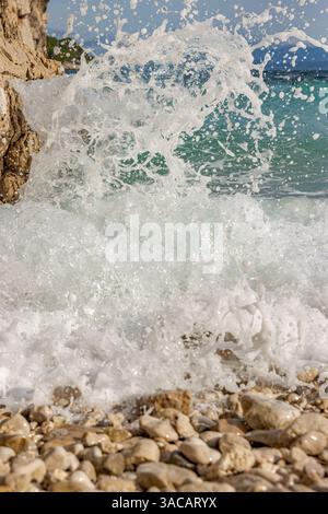 Powerful Waves crushing on a rocky beach Stock Photo - Alamy