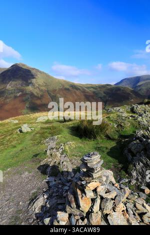 View of the summit cairn of Rannerdale Knotts fell above Crummock Water ...