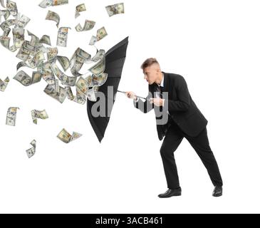 businessman defending with umbrella concept Stock Photo - Alamy