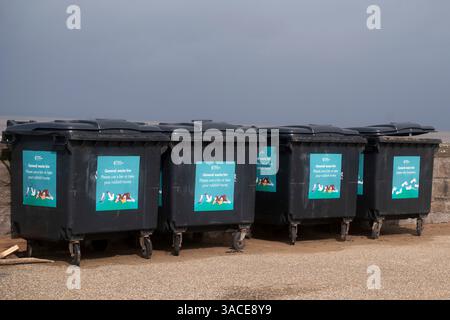 Large commercial bins on the promenade seafront in Weston-super-Mare ...
