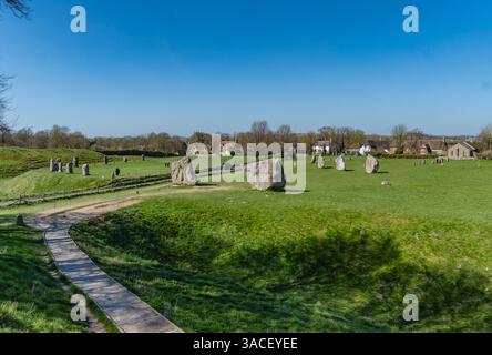 Avebury, UK. 1 April 2025. Visitors exploring UNESCO site Avebury ...