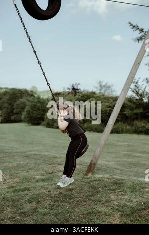 Child is playing at cableway at playground Stock Photo - Alamy