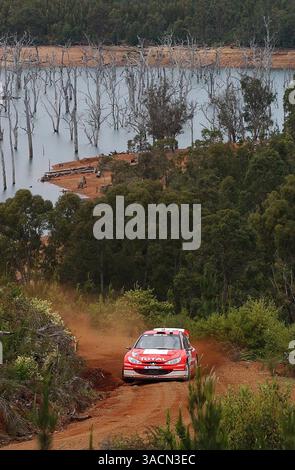 Harri Rovanpera (FIN) / Risto Pietilainen (FIN) Peugeot 206 WRC crosses ...