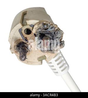 Burnt power plug isolated in white back Stock Photo - Alamy