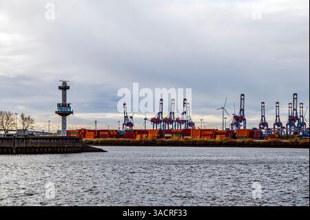Radar tower with water level indicator in front of the ...