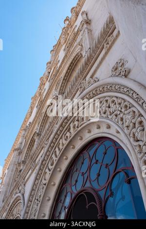 A closeup of window details of an old railroad station building in ...