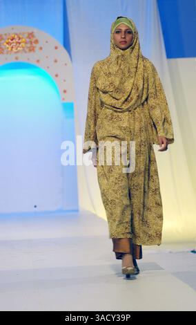 An Iranian model wears an Islamic dress made by Iranian designers at a ...