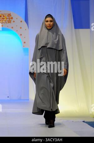 An Iranian model wears an Islamic dress made by Iranian designers at a ...
