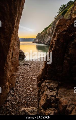 A beautiful shot of cliffs by the sea in the daytime Stock Photo - Alamy