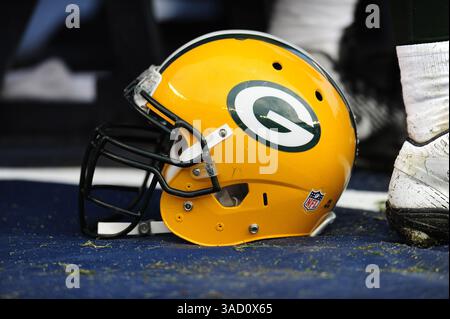 A Green Bay Packers helmet and Super Bowl Vince Lombardi Trophy ...