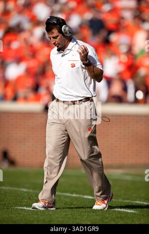 Wake Forest head coach Jake Dickert holds up the Duke's Mayo Bowl ...