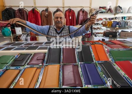 Cyprus, Paphos, Interior view of Salesman in Leatherware Shop Stock ...