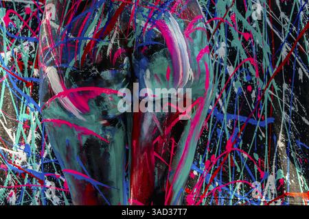 A model poses gracefully, her body adorned in vibrant body paint, with ...