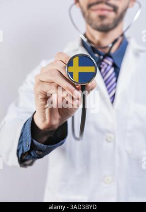 Sweden healthcare system, doctor holding stethoscope. Sweden health and ...