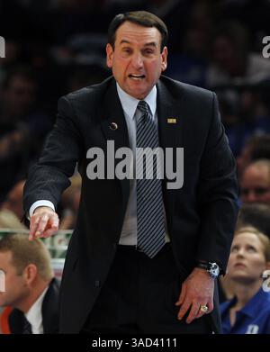 Former Duke coach Mike Krzyzewski, third right, poses for pictures ...