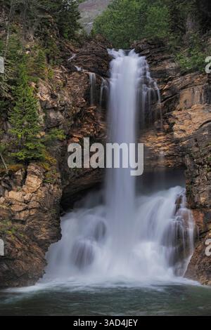 Running Eagle Falls in Glacier National Park showcases the natural ...