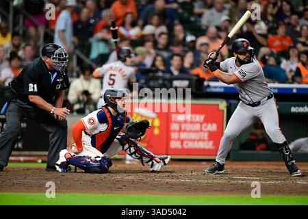 Houston Astros' Yainer Diaz, left, celebrates near first base coach ...