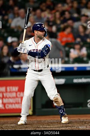 Houston Astros first baseman Christian Walker warms up before a ...