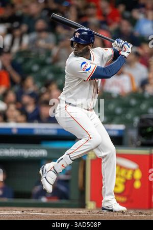 Houston Astros' Yordan Alvarez (44) hugs Jeremy Peña (3) after hitting ...