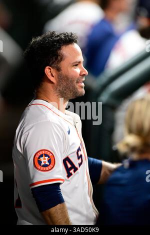 April 27, 2025: Houston Astros second baseman Mauricio Dubon (14) warms ...