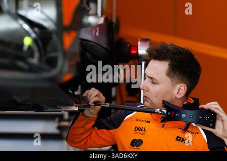 McLaren F1 Team engineers and MCL39 in the garage during the Formula ...