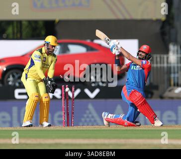 Delhi Capitals' captain Axar Patel leaves the field after a muscle ...