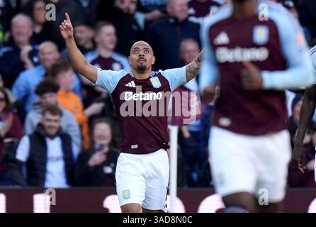 Aston Villa's Donyell Malen (second from left) celebrates scoring their ...