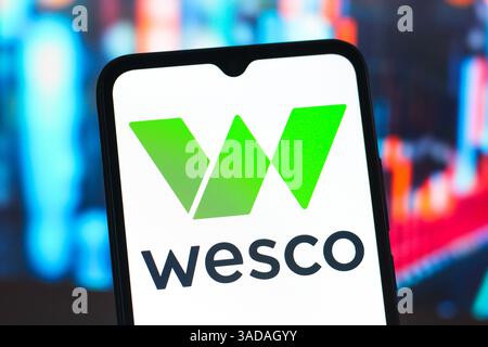 In this photo illustration, the WESCO International logo is seen on a smartphone screen Stock ...