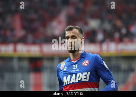 LINZ, AUSTRIA - APRIL 5: Petar Filipovic of GAK and Samuel Adeniran of ...
