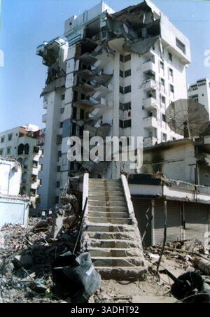Feb 02, 2001; Bhuj, India; Cranes clear up rubble & debris from ...