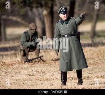 Reenactor in Waffen-SS German uniform, driver of Jagdpanzer 38 Hetzer ...