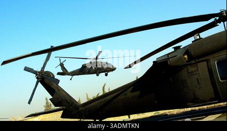 Sep 20, 2005; Baghdad, IRAQ; A crew chief on an Alaska National Guard ...