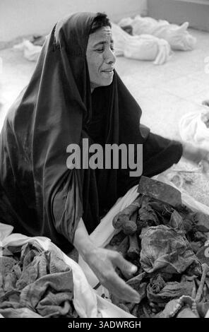 May 21, 2003 - Al-Musayab, Iraq - Bones in shrouds fill the gymnasium ...