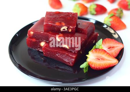 Strawberry halwa, a smooth Indian dessert with a rich pink hue Stock ...