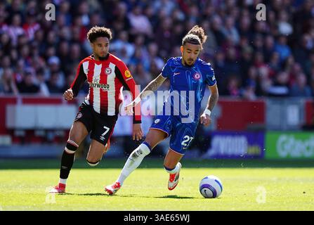 Brentford's Kevin Schade (left) and Chelsea's Cole Palmer battle for ...