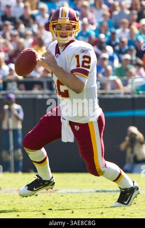 Washington Redskins quarterback John Beck hands off against the San ...