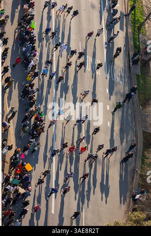 Overhead view of Austin marathon runners on Cesar Chavez Avenue in ...