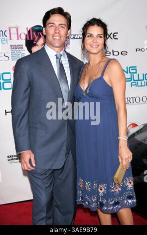 Angie Harmon and husband Jason Seahorn arriving for the 2010 Vanity ...