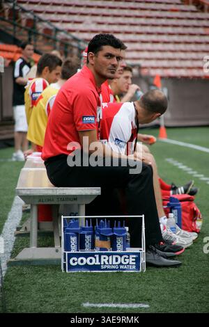 Head coach John Aloisi watches on during a Brisbane Roar training ...