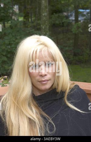 Victoria Gotti, daughter of John Gotti Sr., left, and actress Lindsay ...