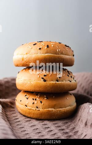 Wheat burger buns on the kitchen table Stock Photo - Alamy