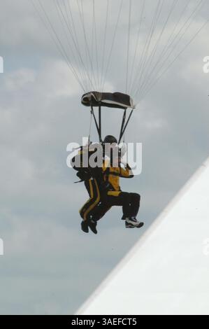 A member of the US Army's Golden Knights parachute team lands at David ...