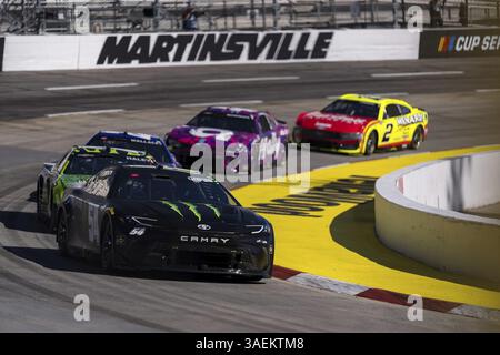 Ty Gibbs (54) drives during a NASCAR Cup Series auto race in Watkins ...