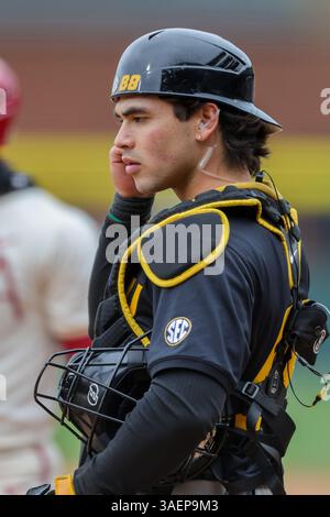 April 6, 2025: Mateo Serna (88) Missouri first baseman blows to warm up ...