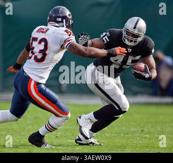 Nick Roach (53) of the Oakland Raiders pursues quarterback Case Keenum ...