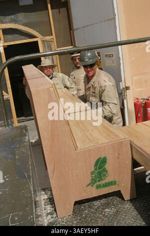 A Naval Mobile Construction Battalion 24 (NMCB-24) M-809 series 5-ton ...