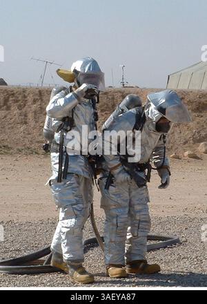 Mar 27, 2005; Al Qaim, Iraq; Lance Cpl. LORENZO OLIVER provides ...
