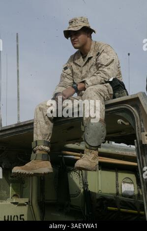 Nov 07, 2004; Camp Baharia, Iraq; A U.S. Marine with Company I, 3rd ...