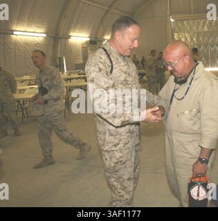 U.S. Marine Brigadier General Michael Langley presents Mary Anne Grey ...
